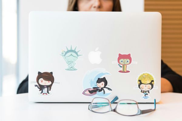 A Guide To Decorating Your Laptop With Stickers: Arranging Ideas